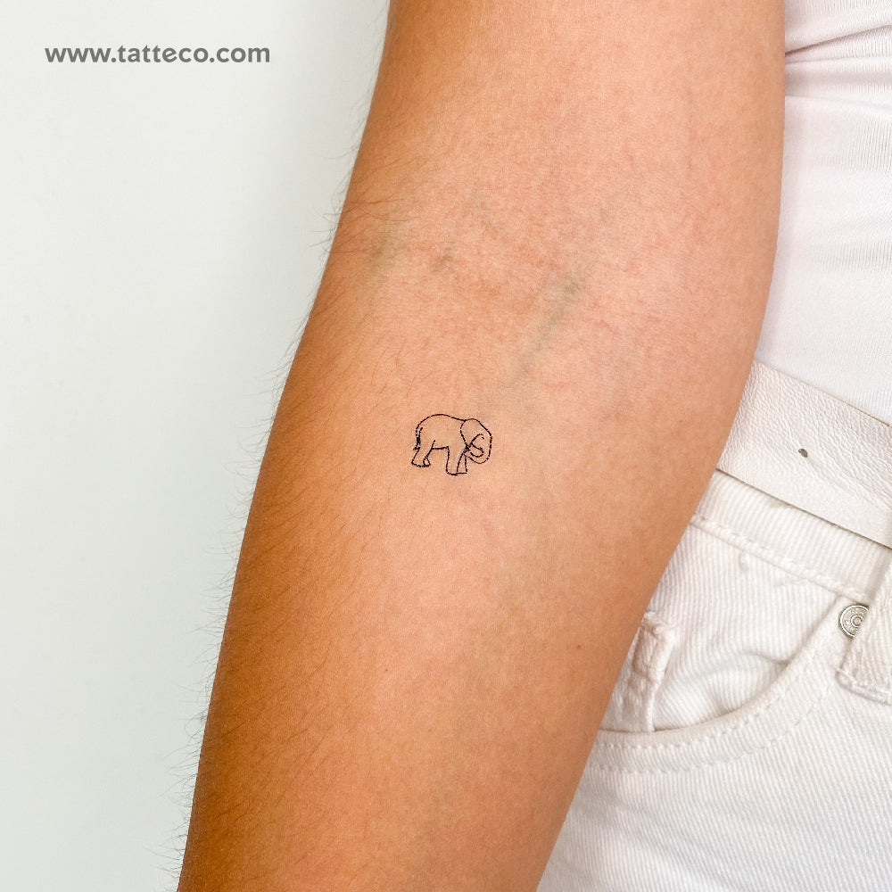 Simple Elephant Outline Tattoo
